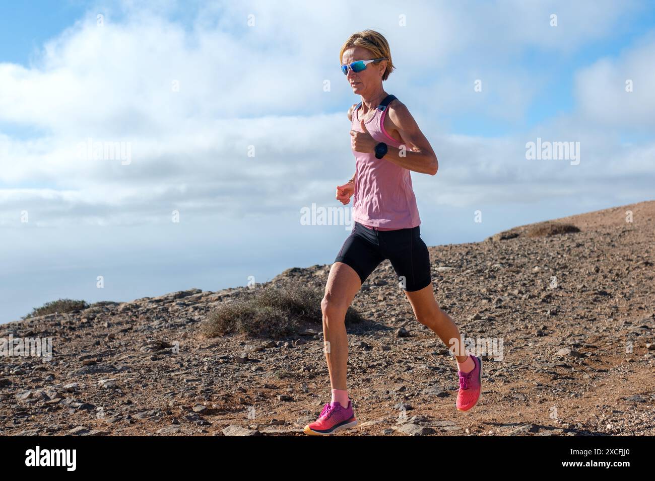 Woman runs energetically on hi-res stock photography and images - Alamy