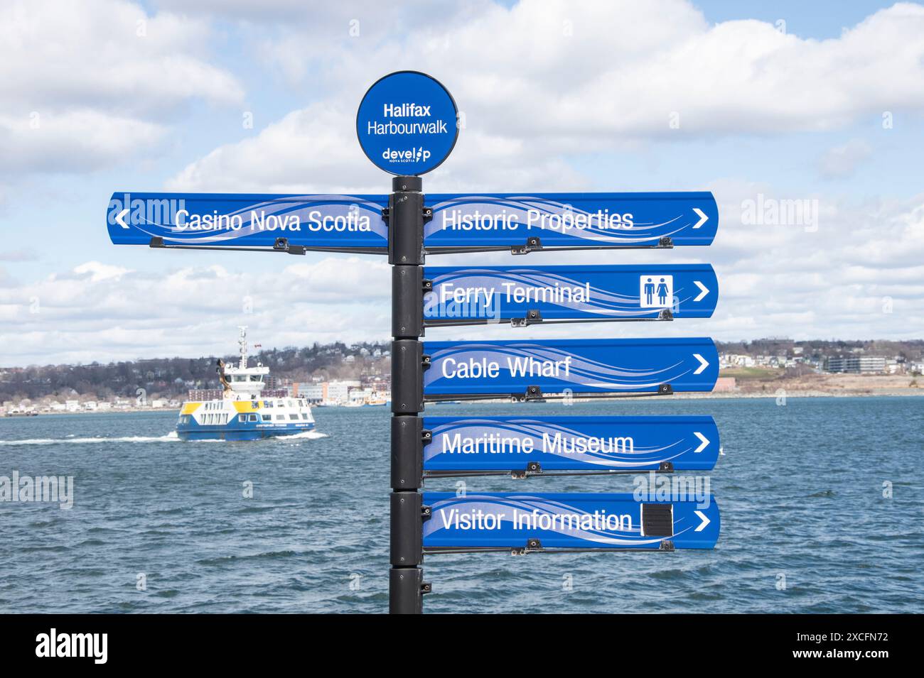 Harbourwalk signs at the waterfront boardwalk in Halifax, Nova Scotia ...