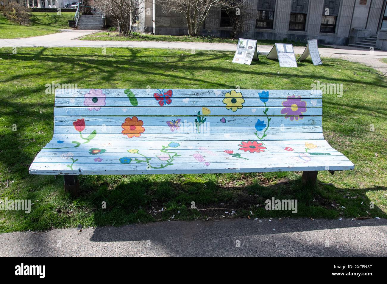 Decorated wooden bench in downtown Halifax, Nova Scotia, Canada Stock ...