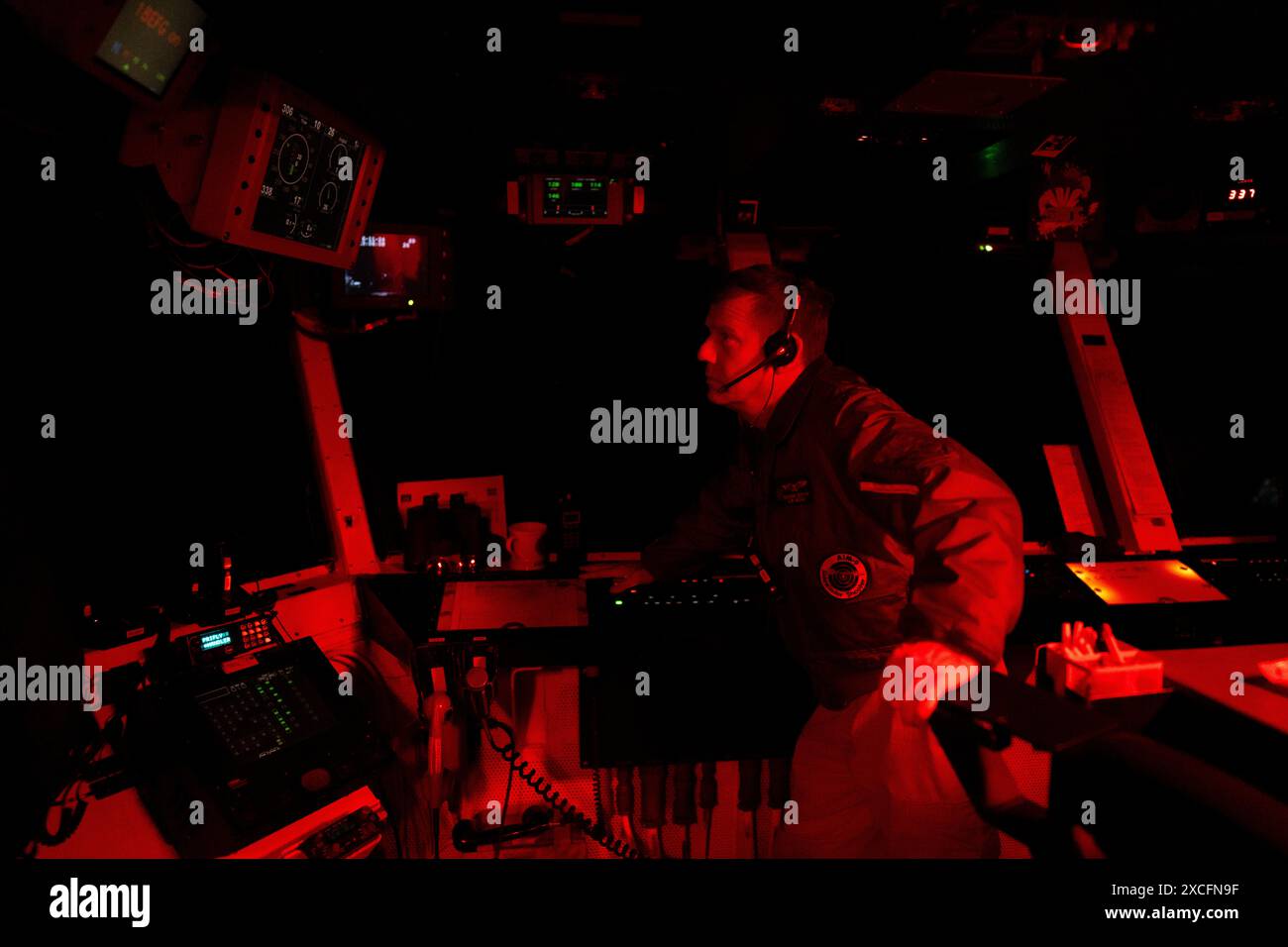 The Air Boss of the USS Dwight D. Eisenhower oversees flight deck ...