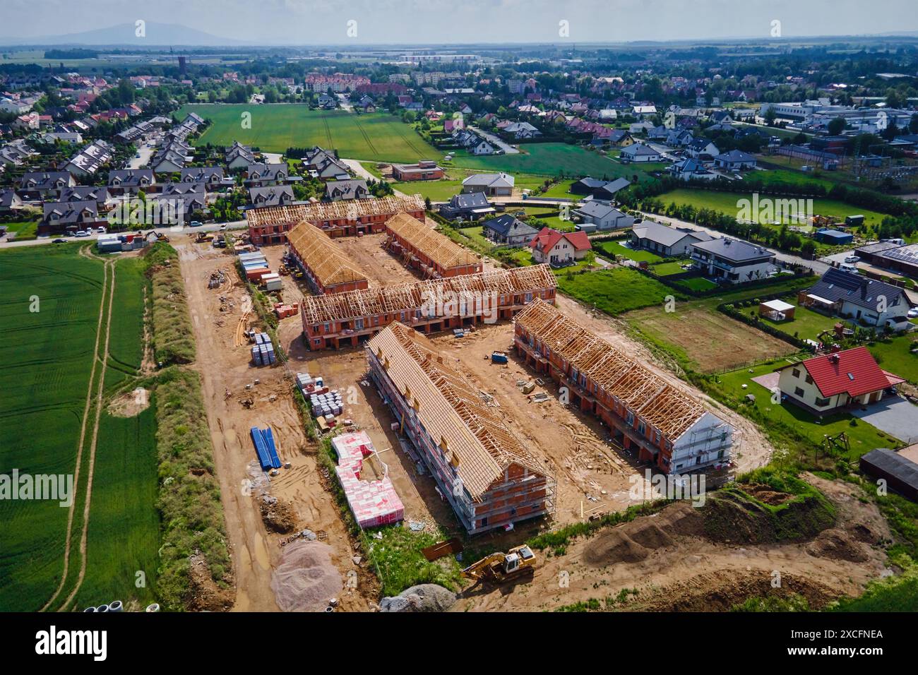 Aerial view of new house construction project in suburban area ...