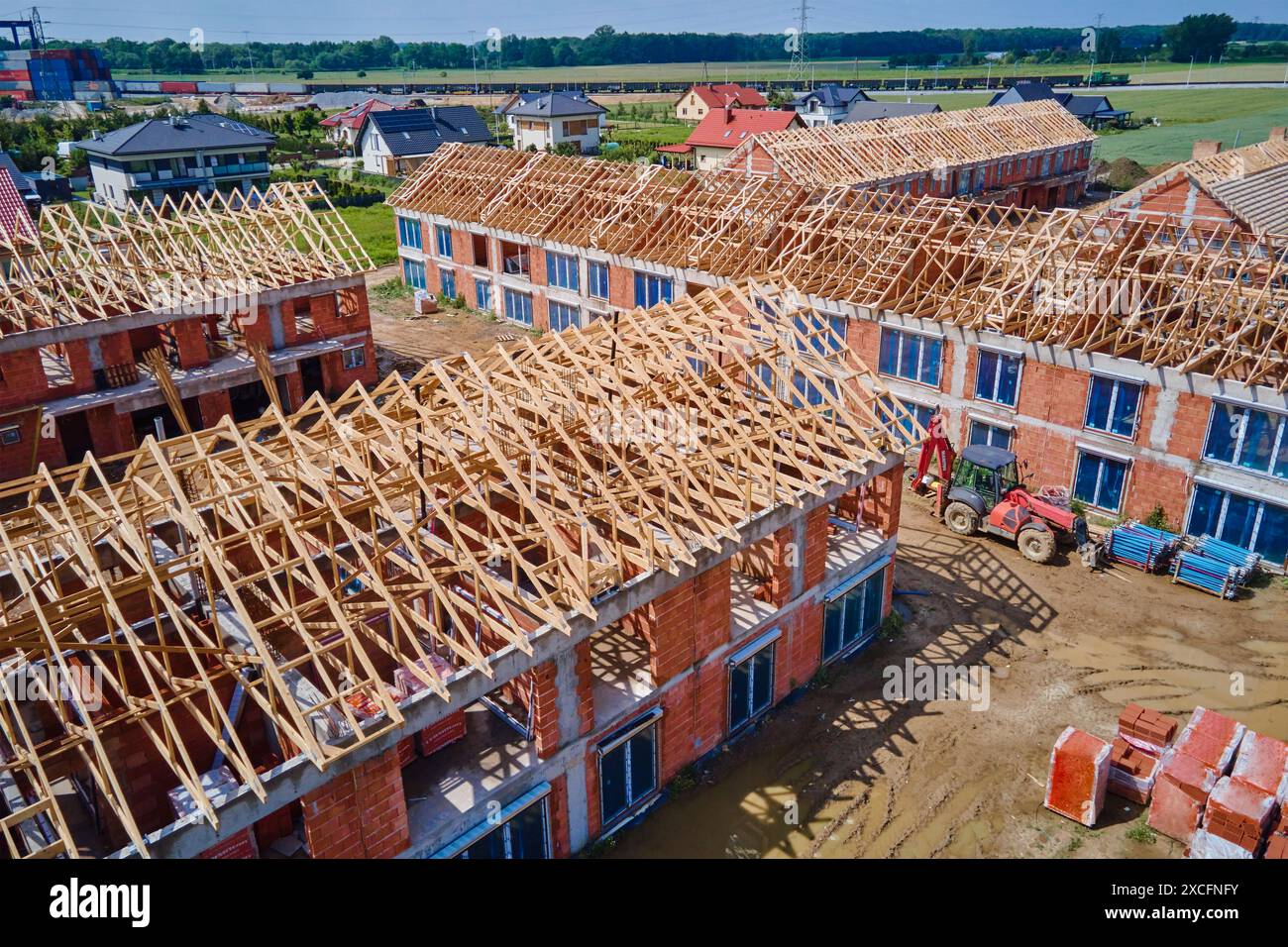 Aerial view of new house construction project in suburban area ...