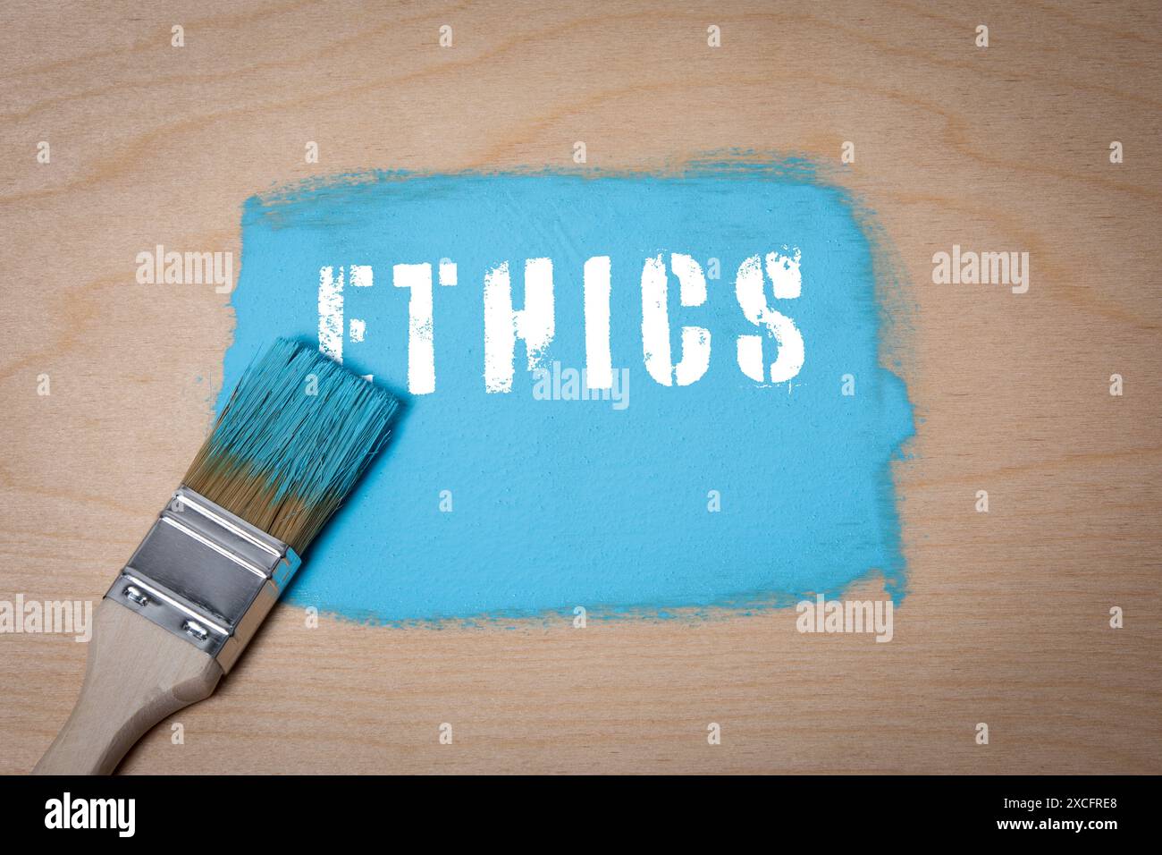 ETHICS. Blue color and text on wood texture background Stock Photo - Alamy
