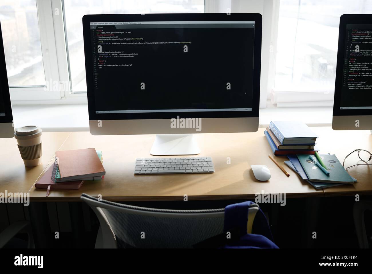 High angle view no people shot of computer monitor with code on screen ...