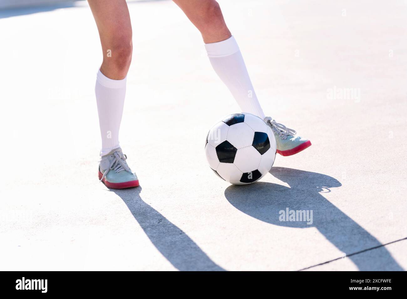 Female athlete dribbling with a soccer ball hi-res stock photography ...