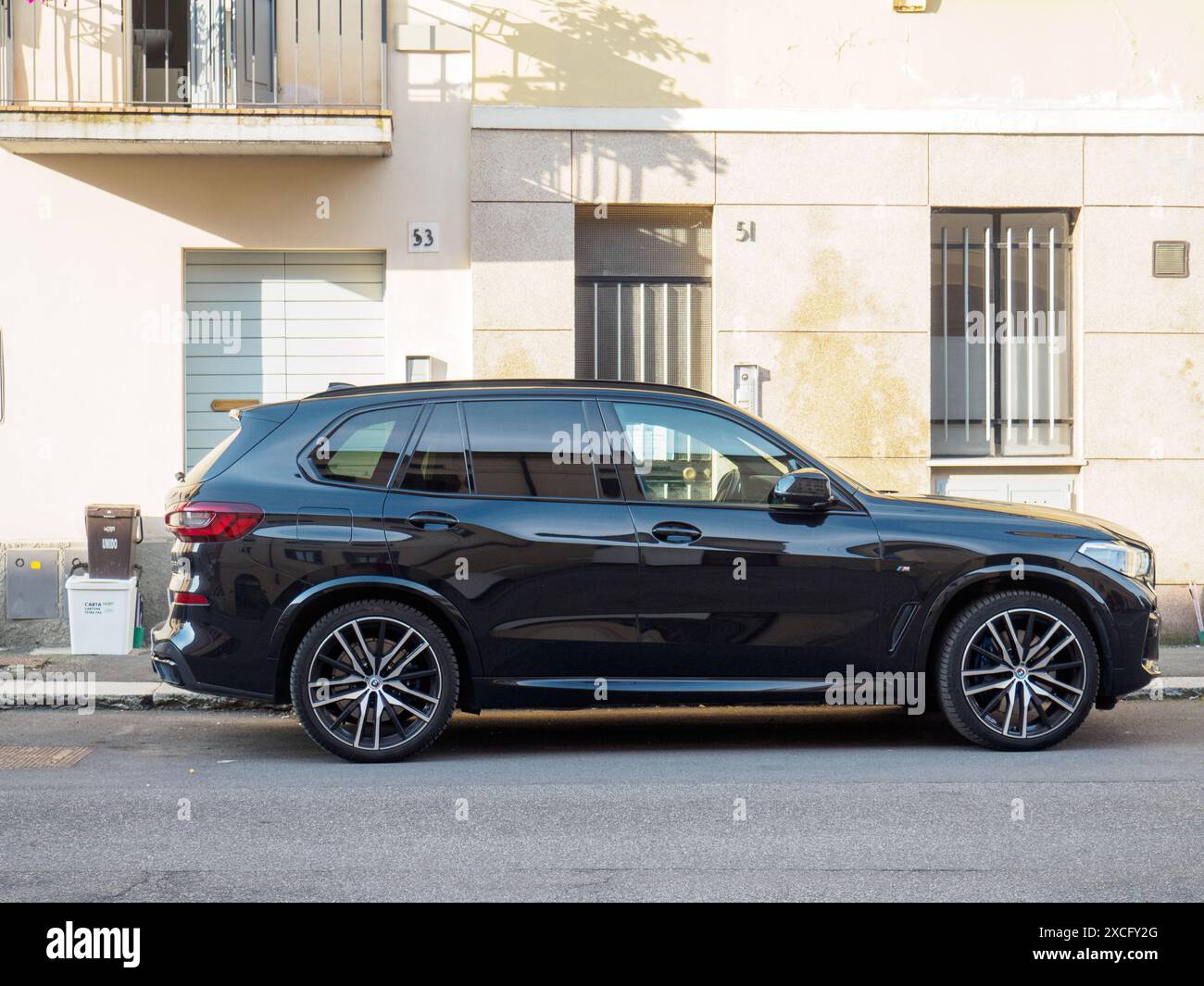 Cremona, Italy - June 10th 2024 BMW M5 Luxury suv parked on a city street in a contemporary ...