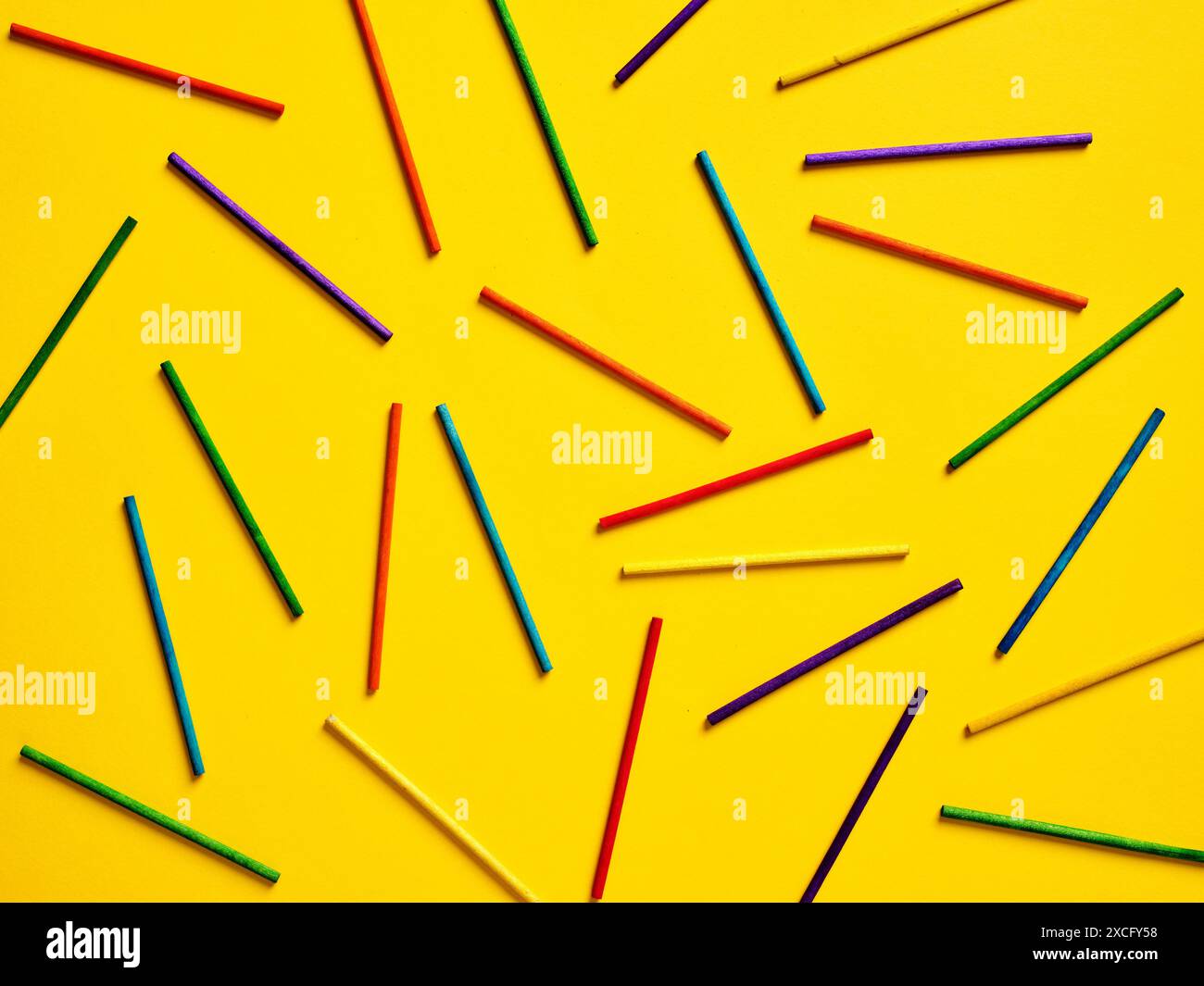 Abstract geometric yellow background with colorful cylinder stick ...