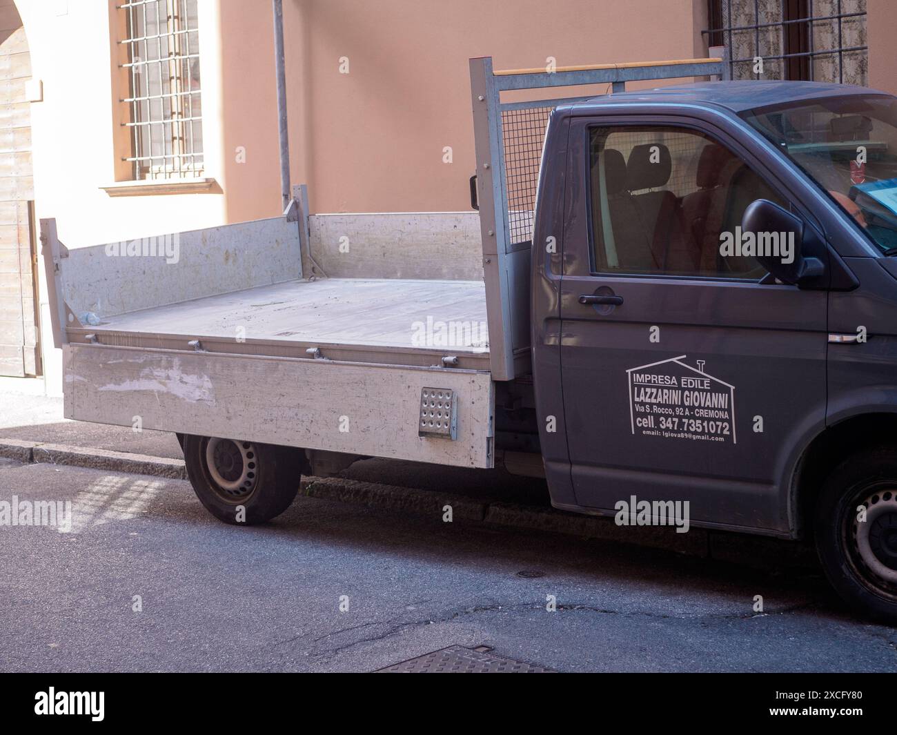 Cremona, Italy - June 10th 2024 Empty flatbed truck is parked on the ...