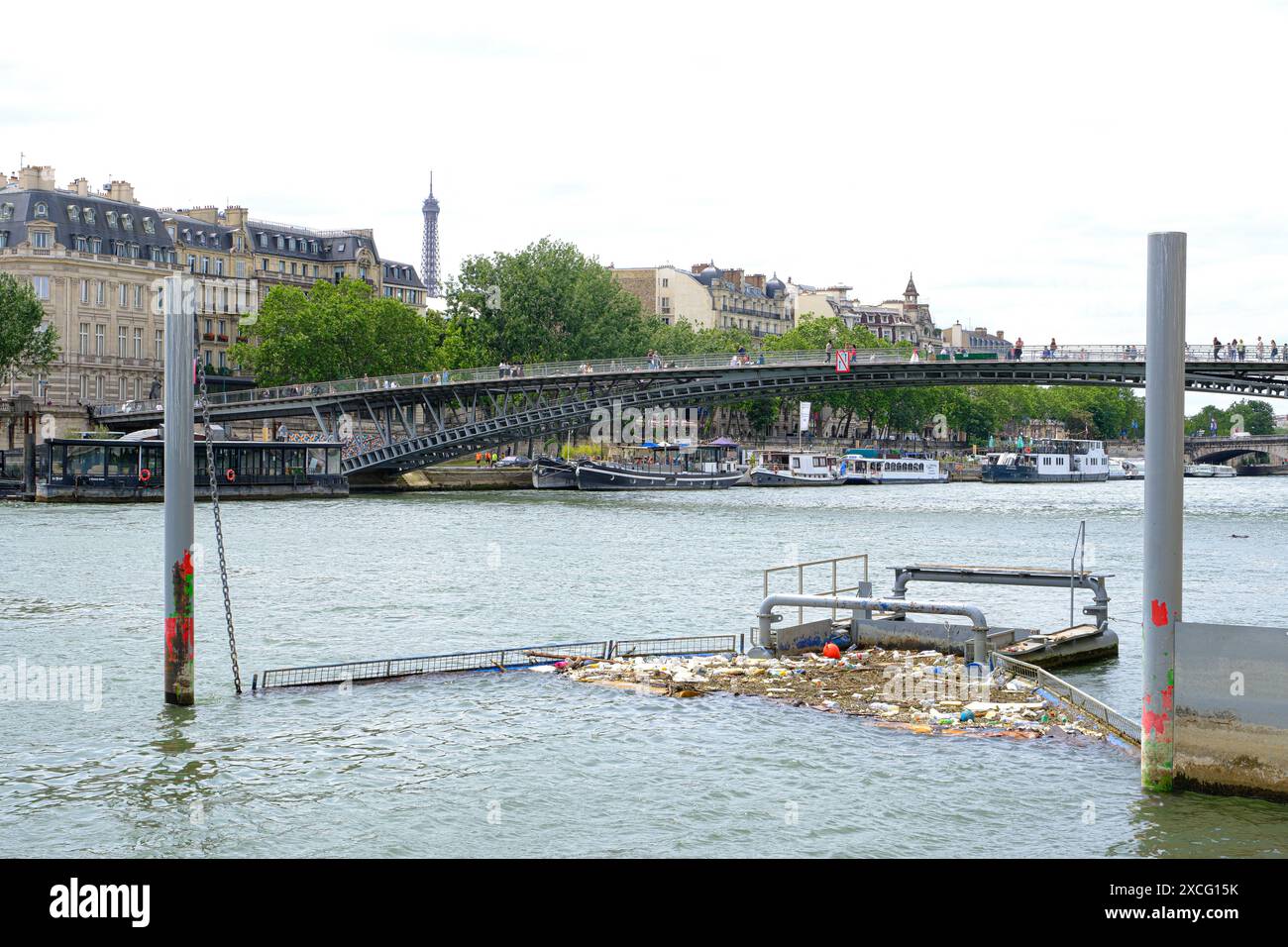 Waste collector floating on the Seine river in Paris, France on June 14 ...