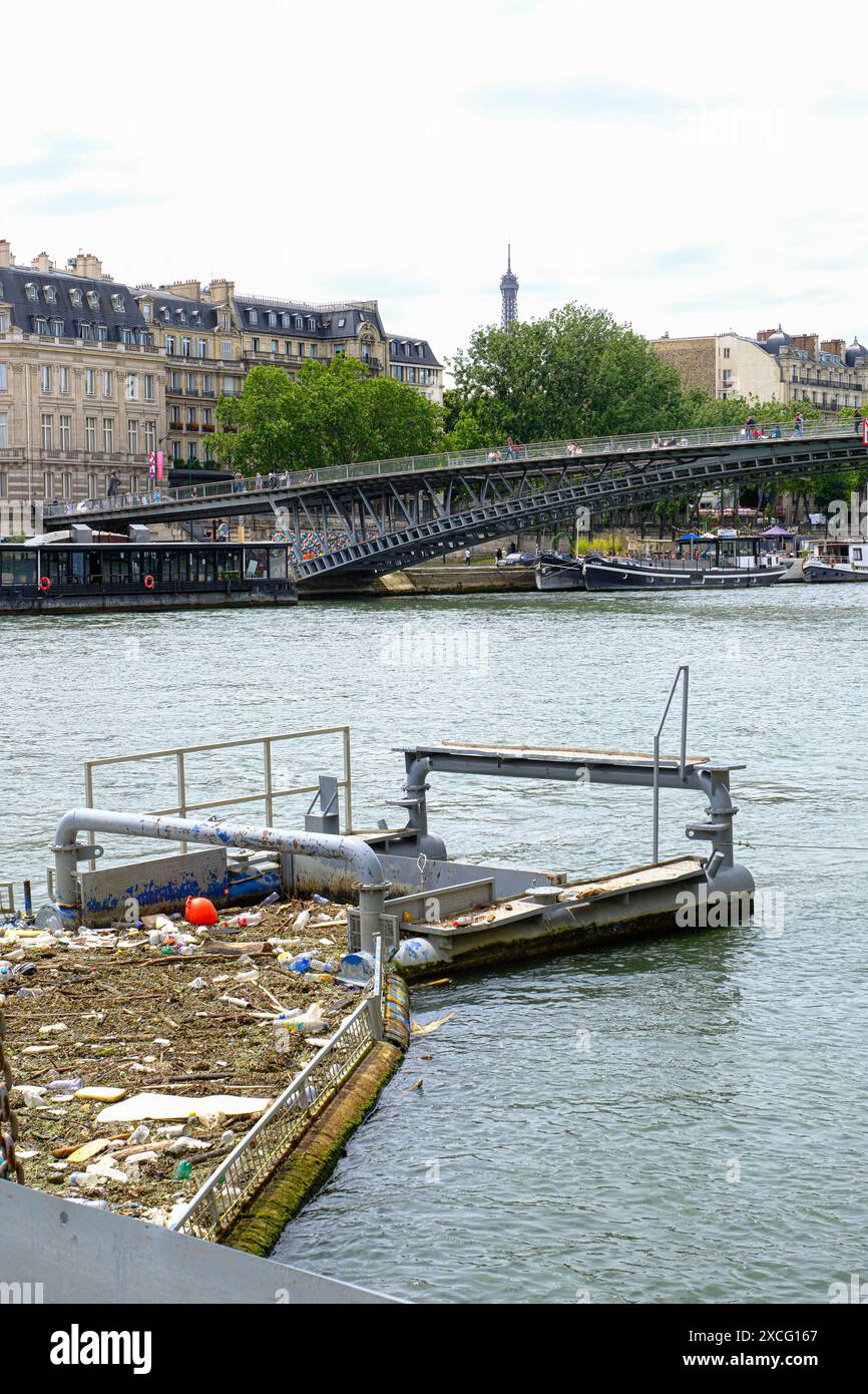 Waste collector floating on the Seine river in Paris, France on June 14 ...