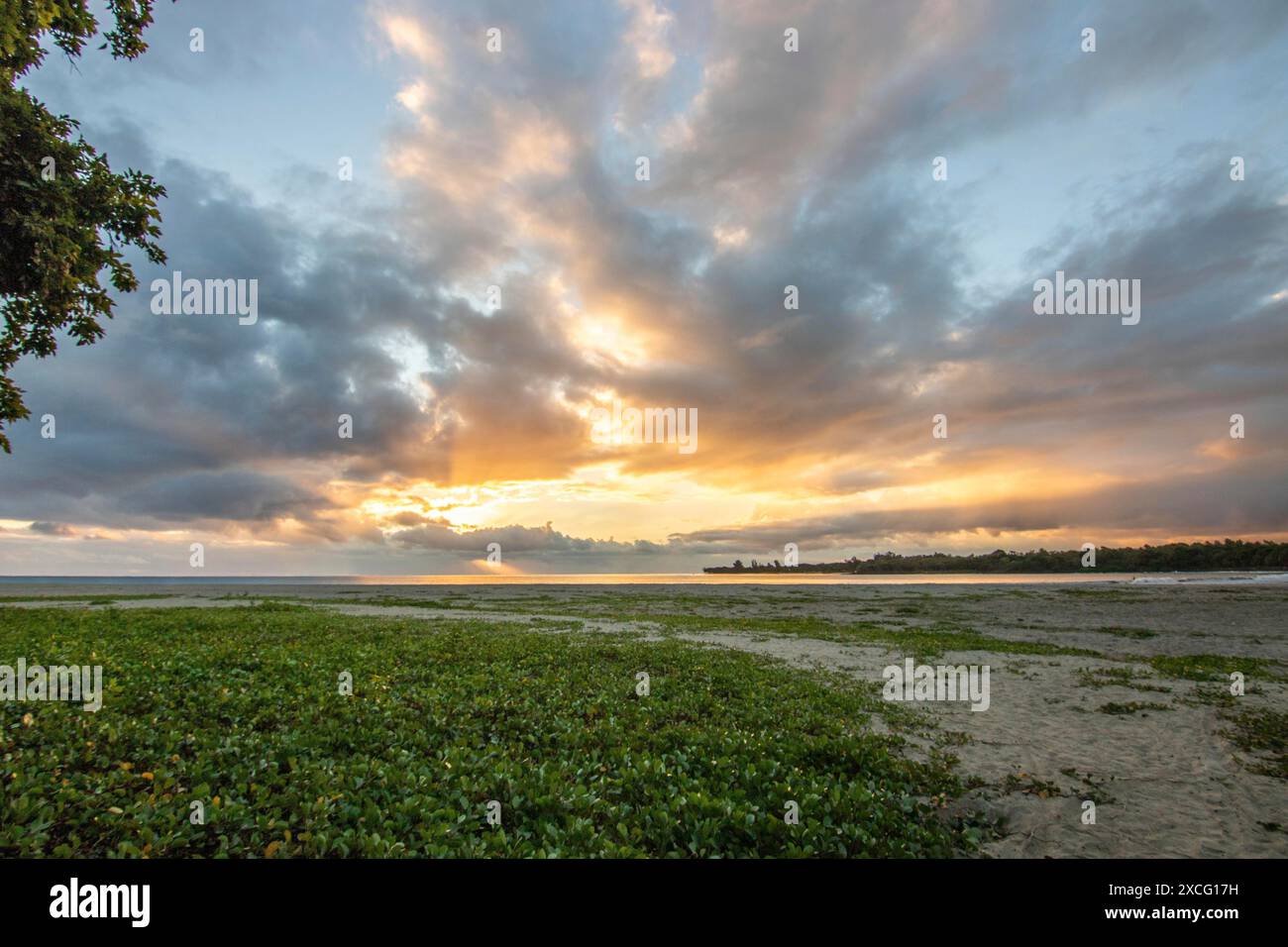 A bay on a river. Dream beach in a pastel-coloured sunset on a holiday ...