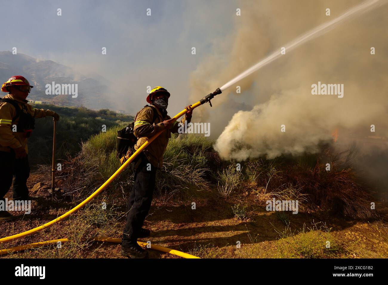 Los Angeles, USA. 17th June, 2024. Firefighters operate at a site of ...