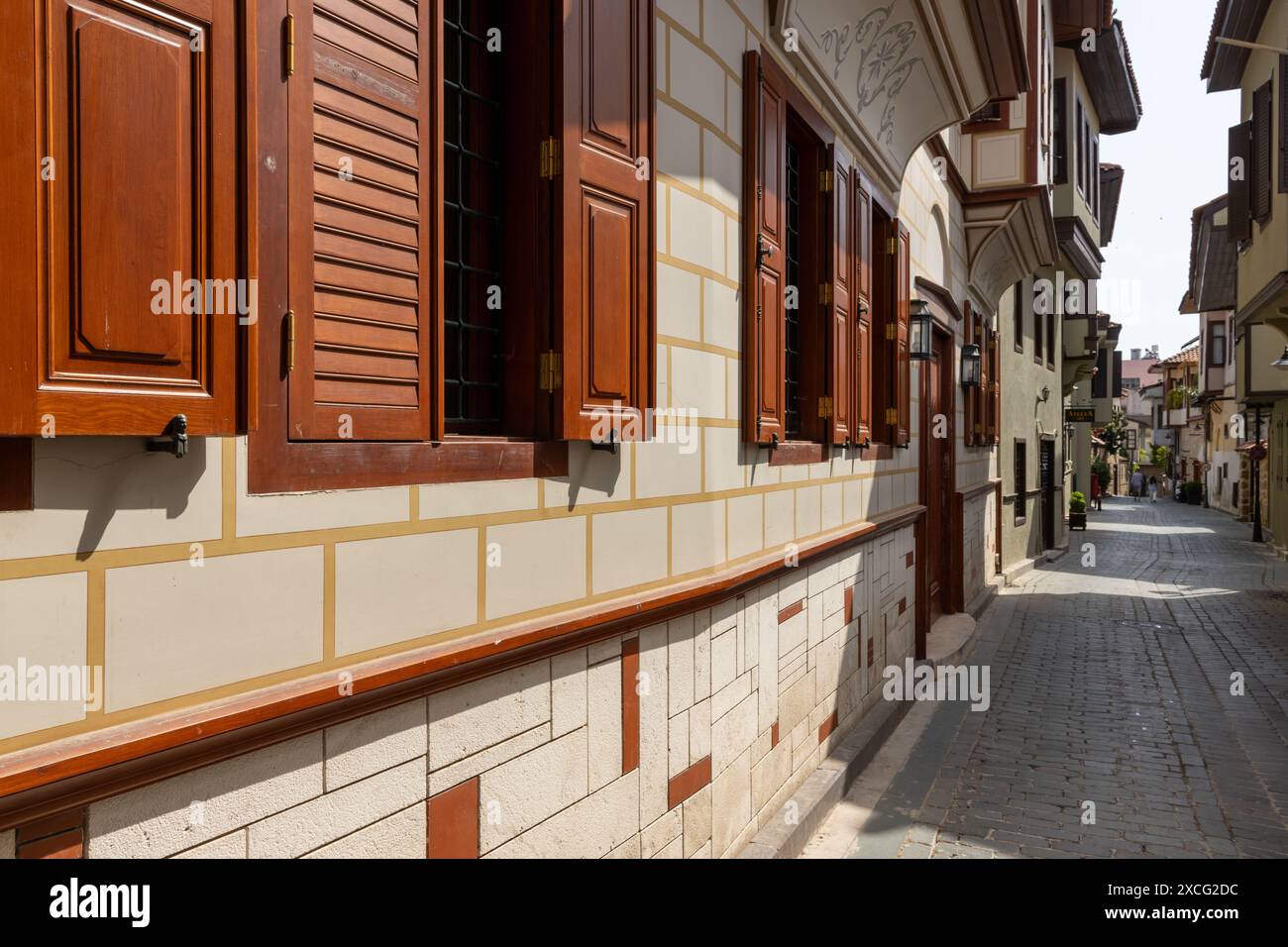 A beautiful traditional street in the historic Kaleiçi old town of ...
