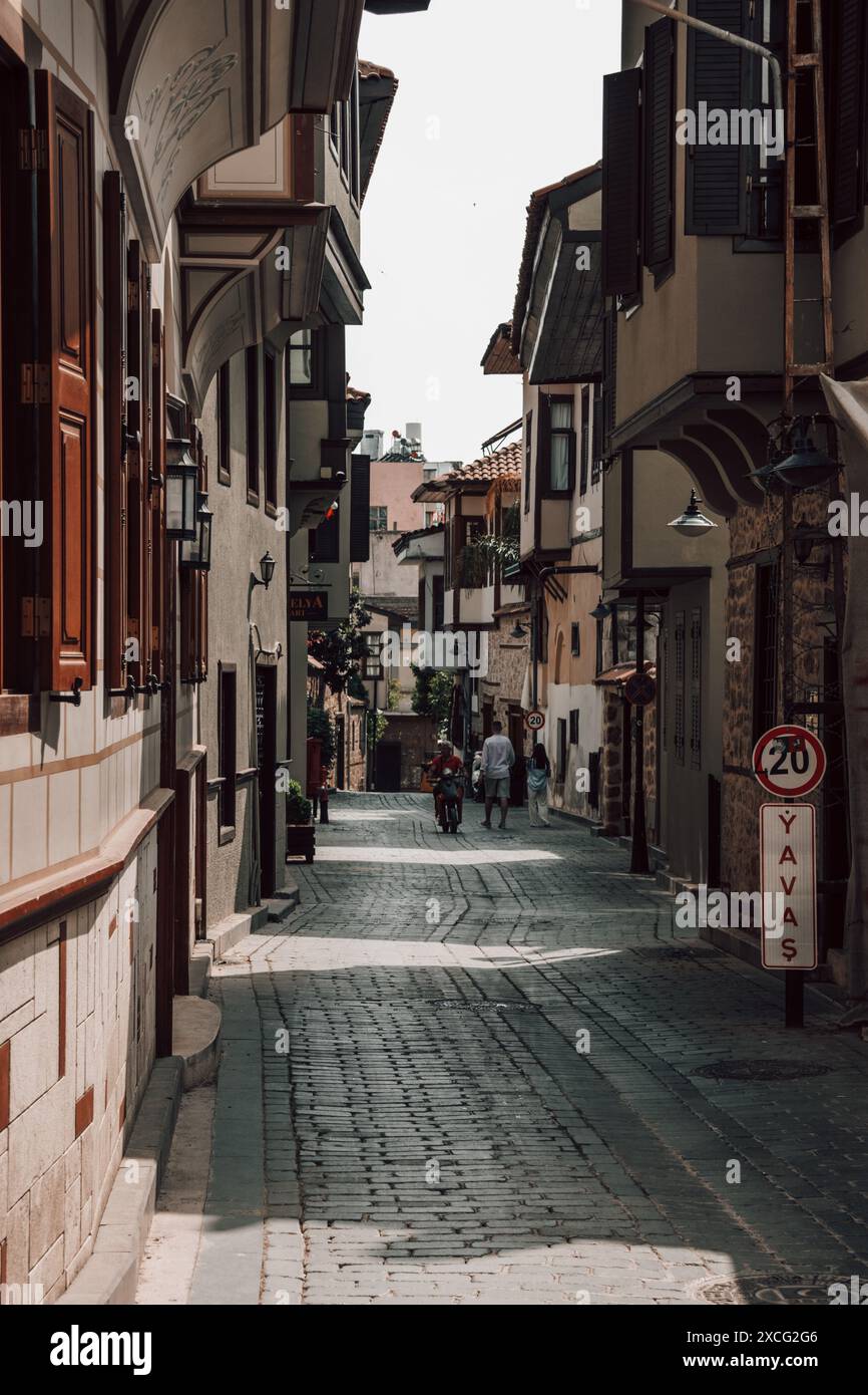 A beautiful traditional street in the historic Kaleiçi old town of ...