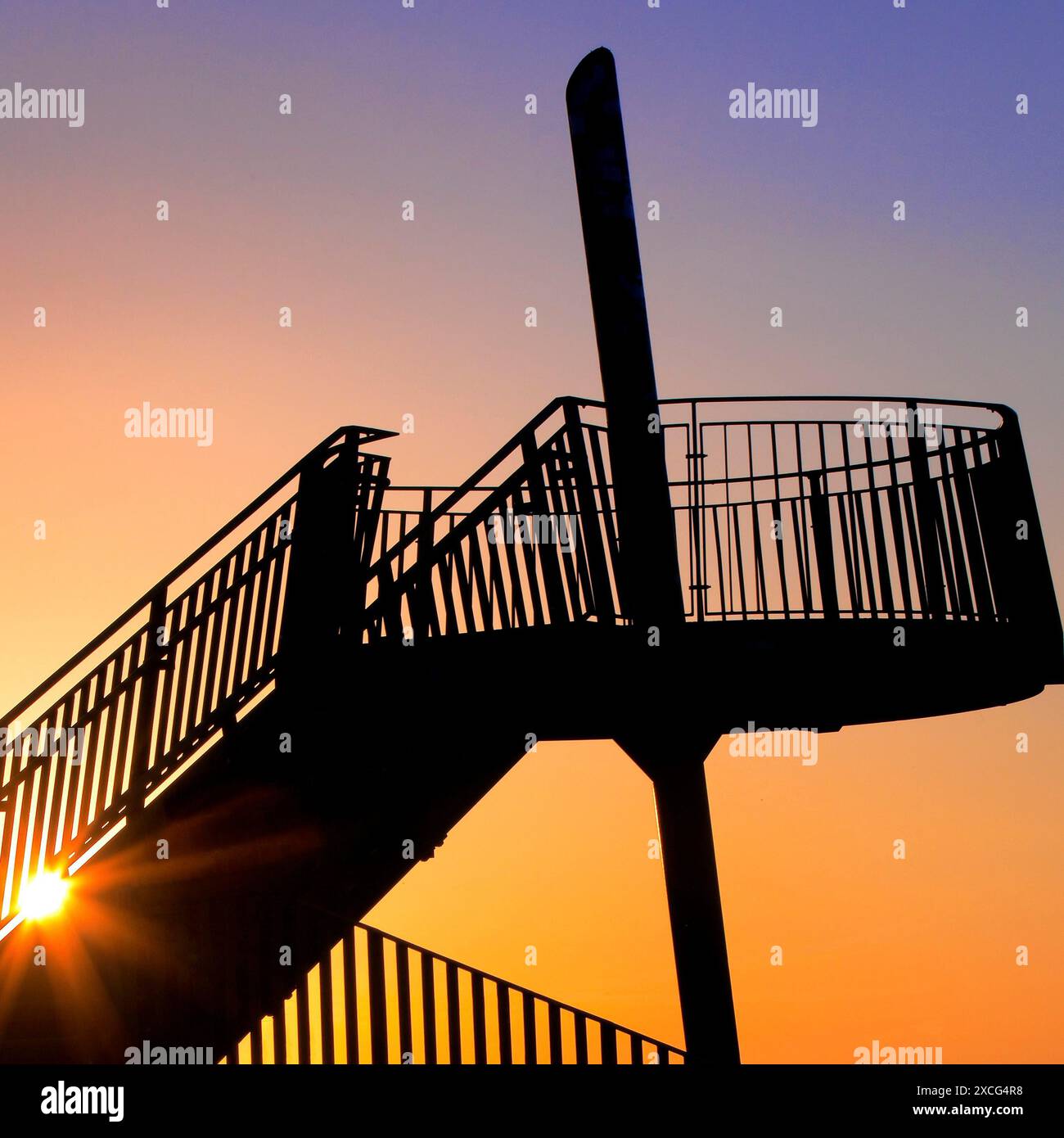 Viewing platform of the Pluto spoil tip at atmospheric sunset, Herne ...