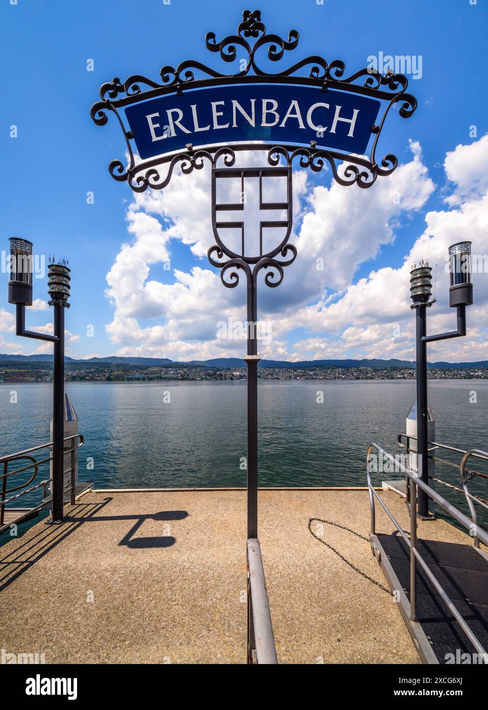 Erlenbach ZH, Switzerland - June 13, 2024: Serene lakeside with ...