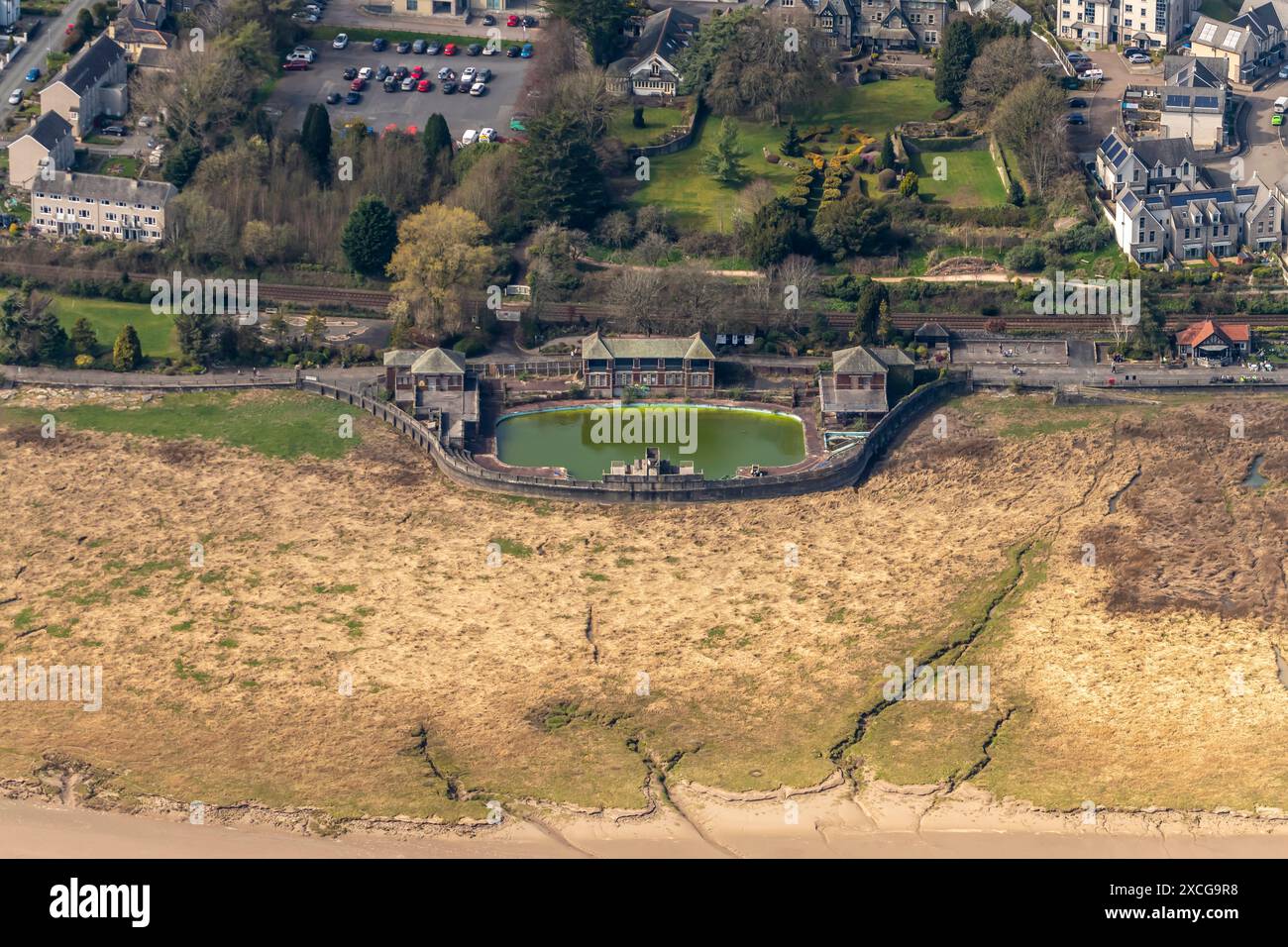 Aerial poto of the Lido at Grange over Sands with green algae filled ...