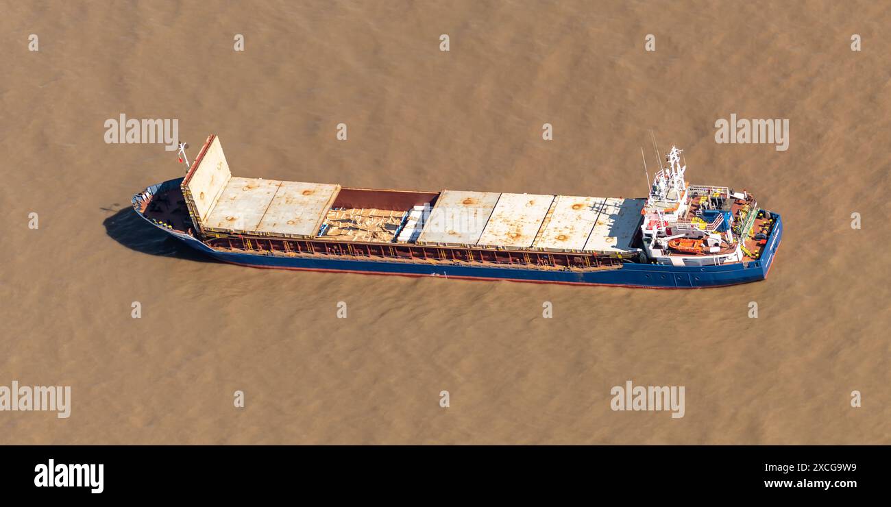 Aerial photo of MV Endeavour ship in the Humber Estuary with holds open ...