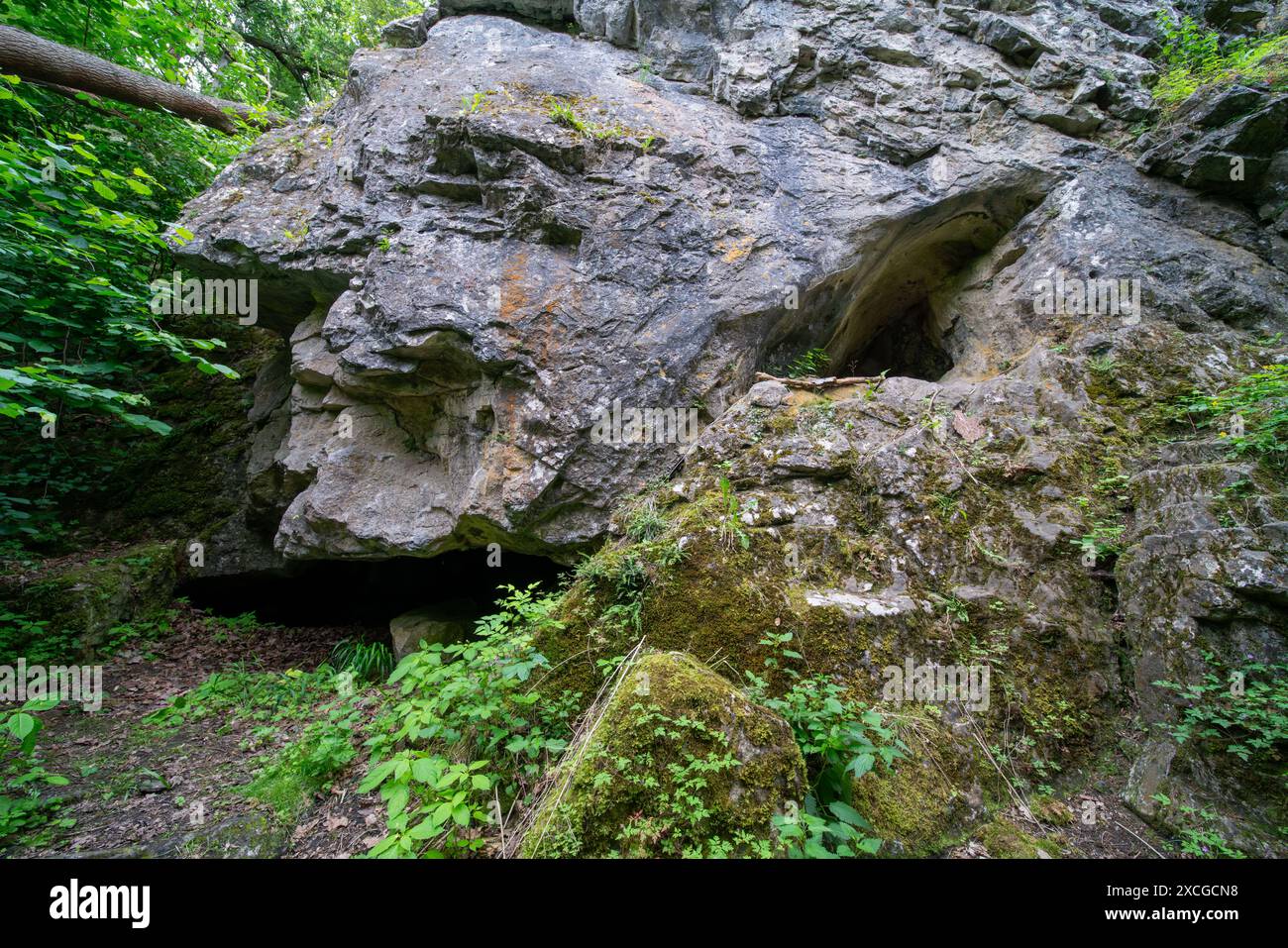 Kopaninská (Pod Zubákem) cave in Prague. A look at both entrances to ...