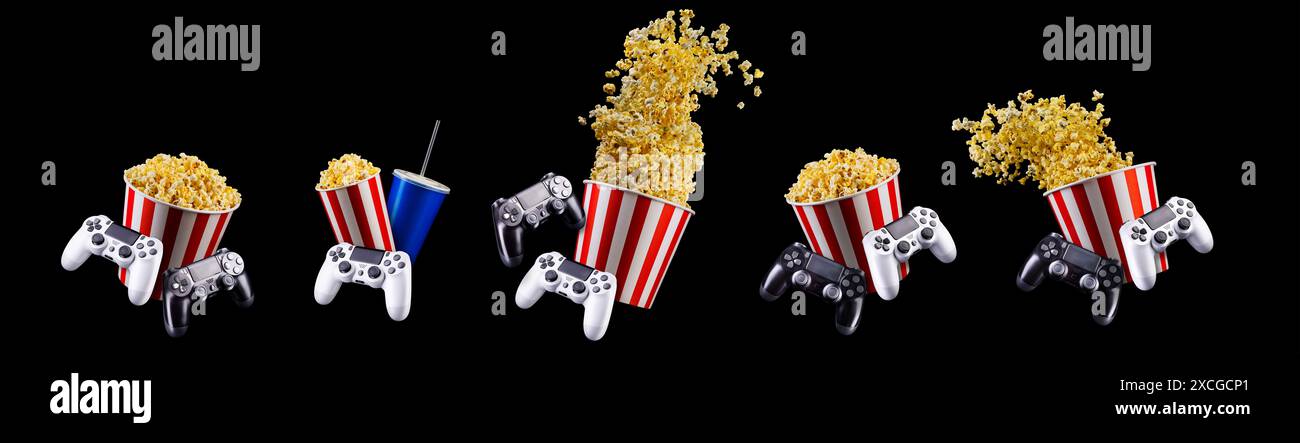 Paper bucket with popcorn, cup of drink and video game joystick on ...