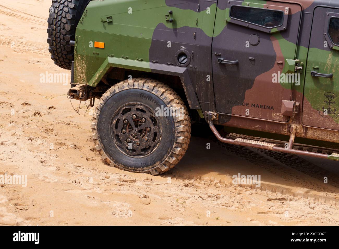 Gijon, Spain - May, 24, 2024: Close-up of a military vehicle wheel tire ...