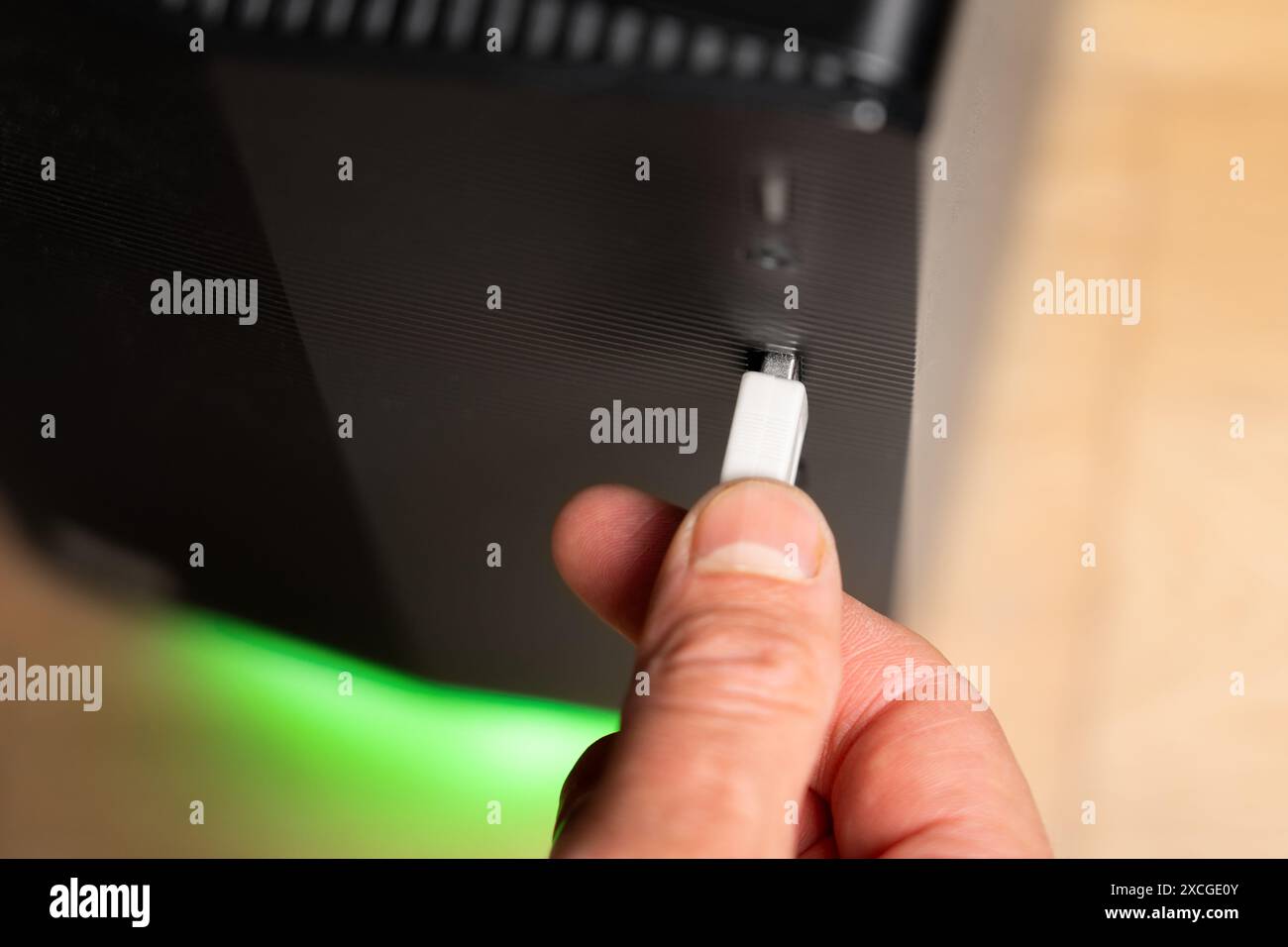 Hand inserting white usb hi-res stock photography and images - Alamy