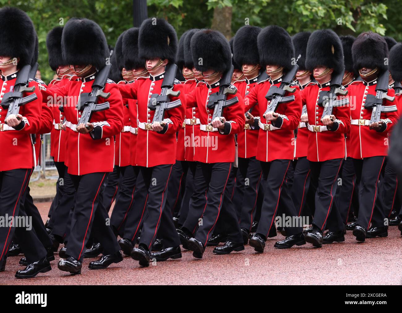 Grenadier Guards march up The Mall. The Royal family including King ...