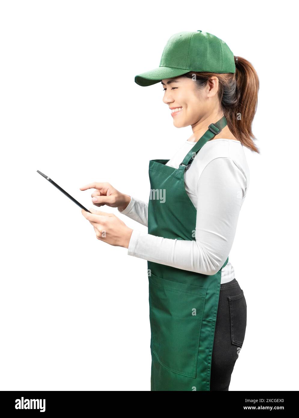 Asian woman shopkeeper Cut Out Stock Images & Pictures - Alamy