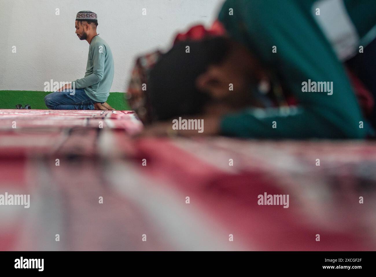 Kathmandu, Nepal. 17th June, 2024. A Nepali Muslim man attends the mass ...