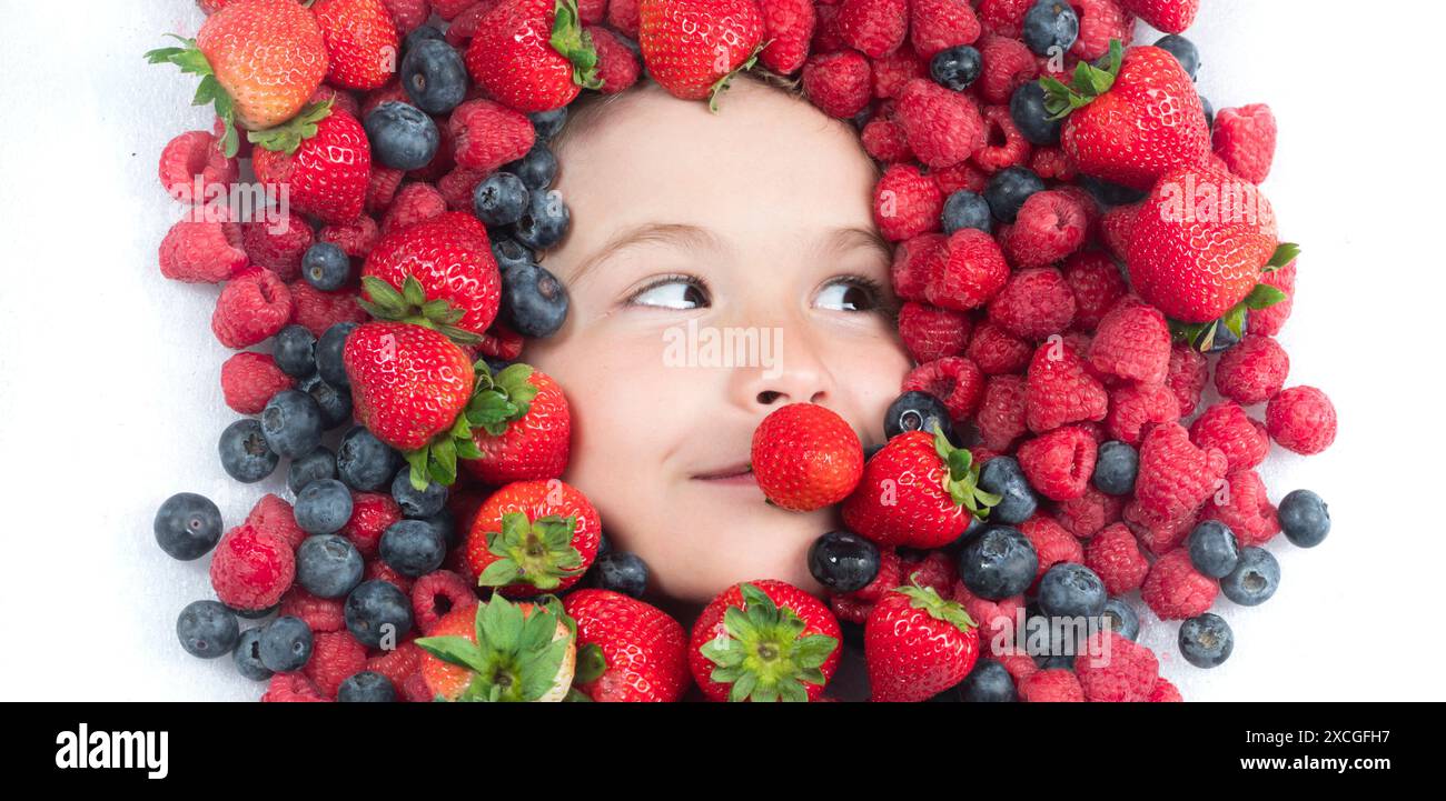 Funny fruits. Mix of berries. Kids face with fresh berries fruits ...