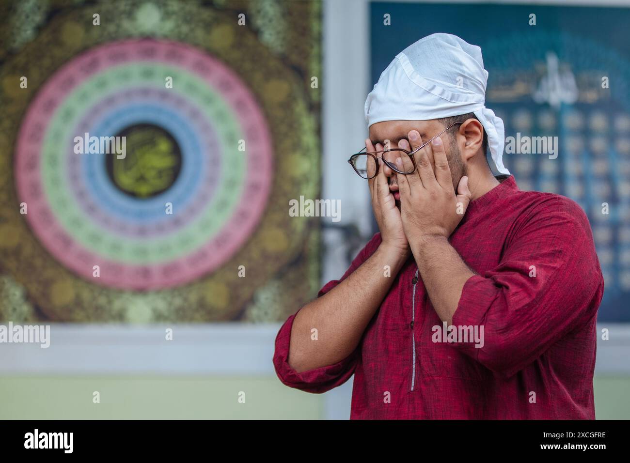 Kathmandu, Nepal. 17th June, 2024. A Nepali Muslim man attends the mass ...