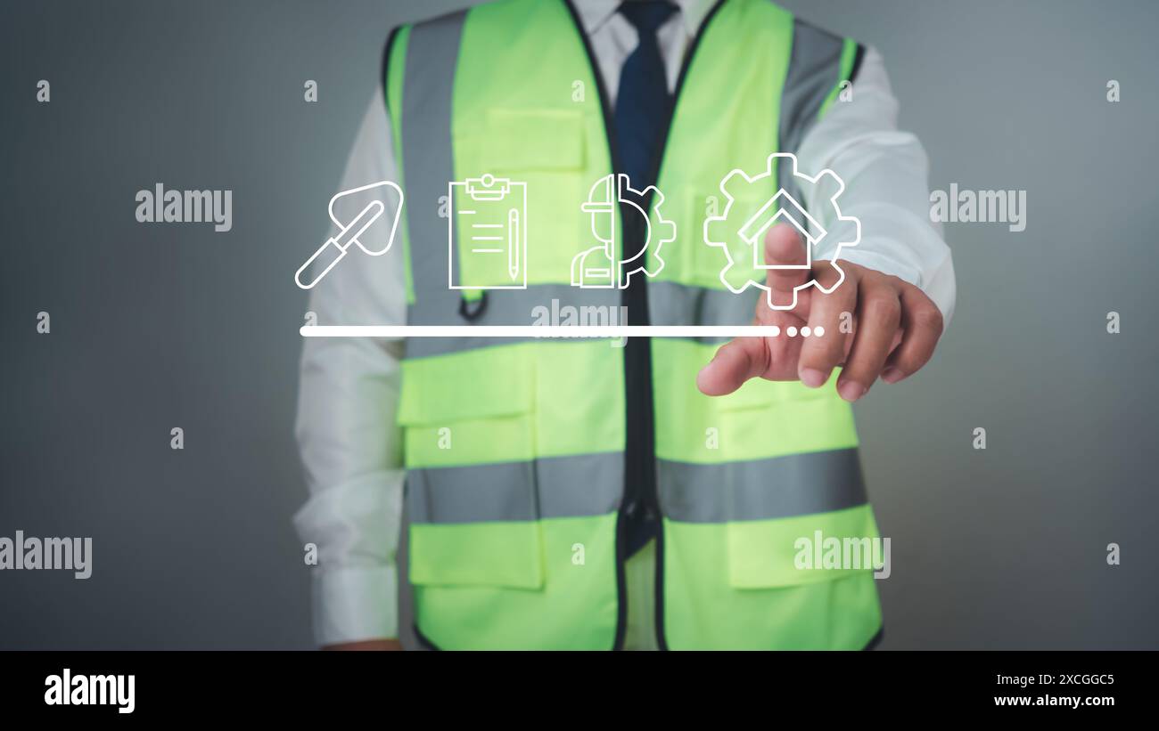 Architect or engineer Pointing finger at construction related icons ...