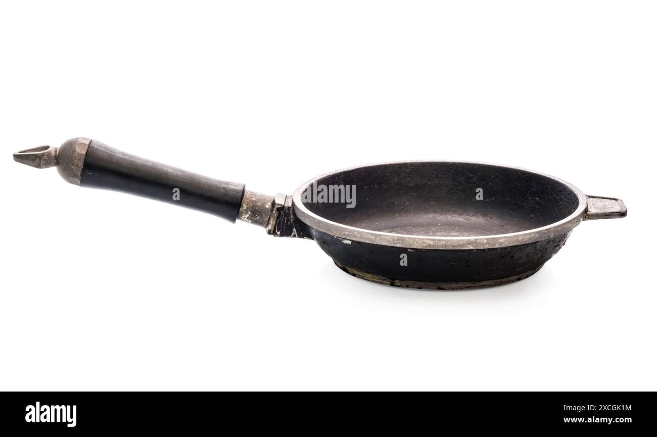 Old empty cast iron frying pan isolated on white background Stock Photo ...