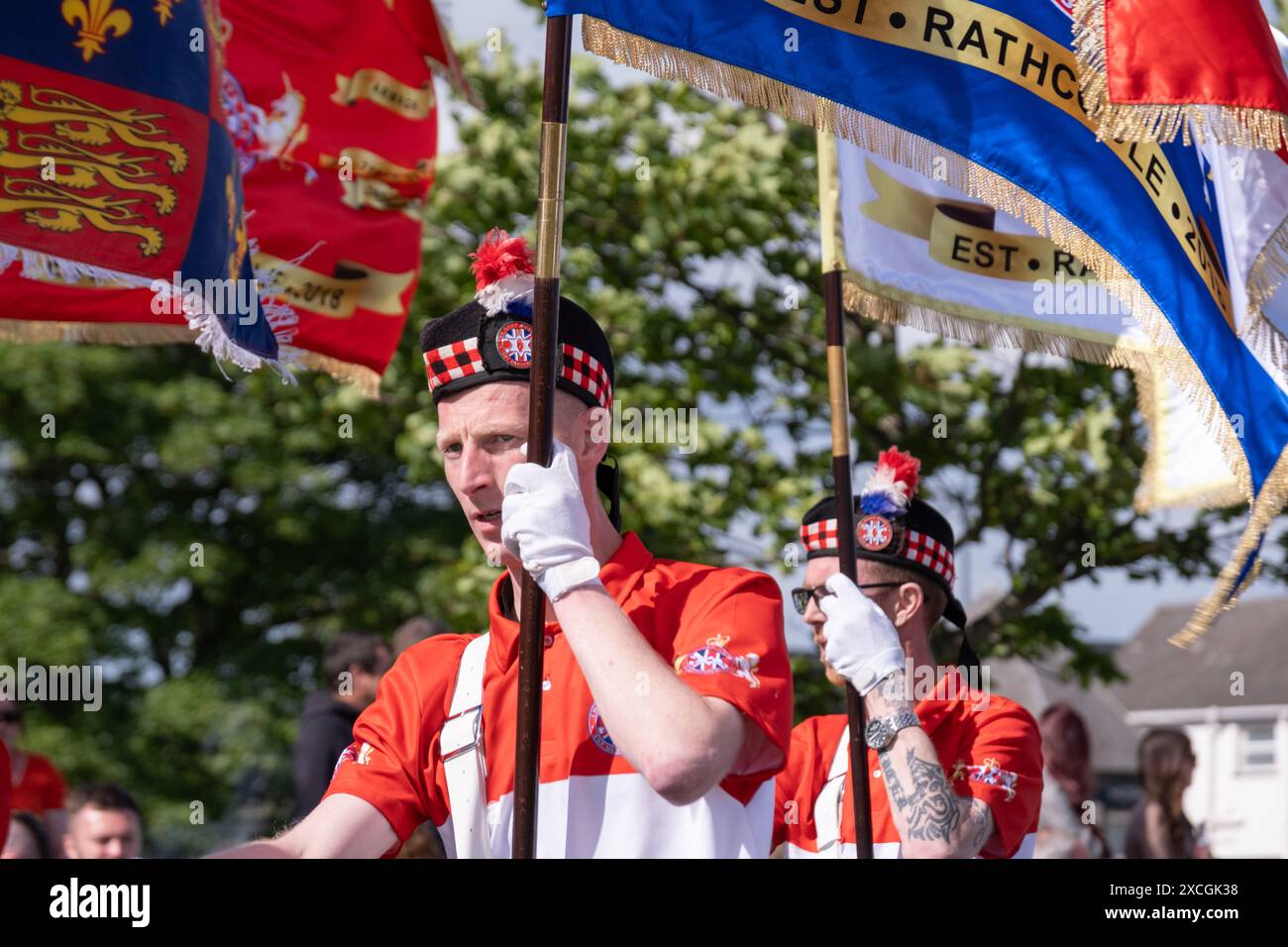Flags of the Billy Boys Flute Band on parade in Carrickfergus during ...