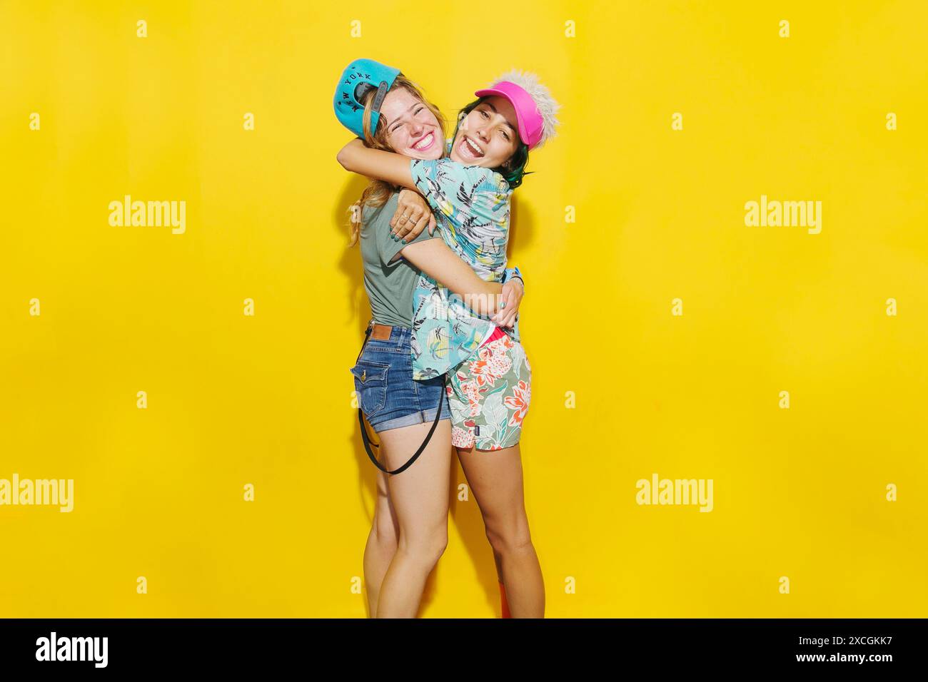 Two girls cuddling hi-res stock photography and images - Alamy