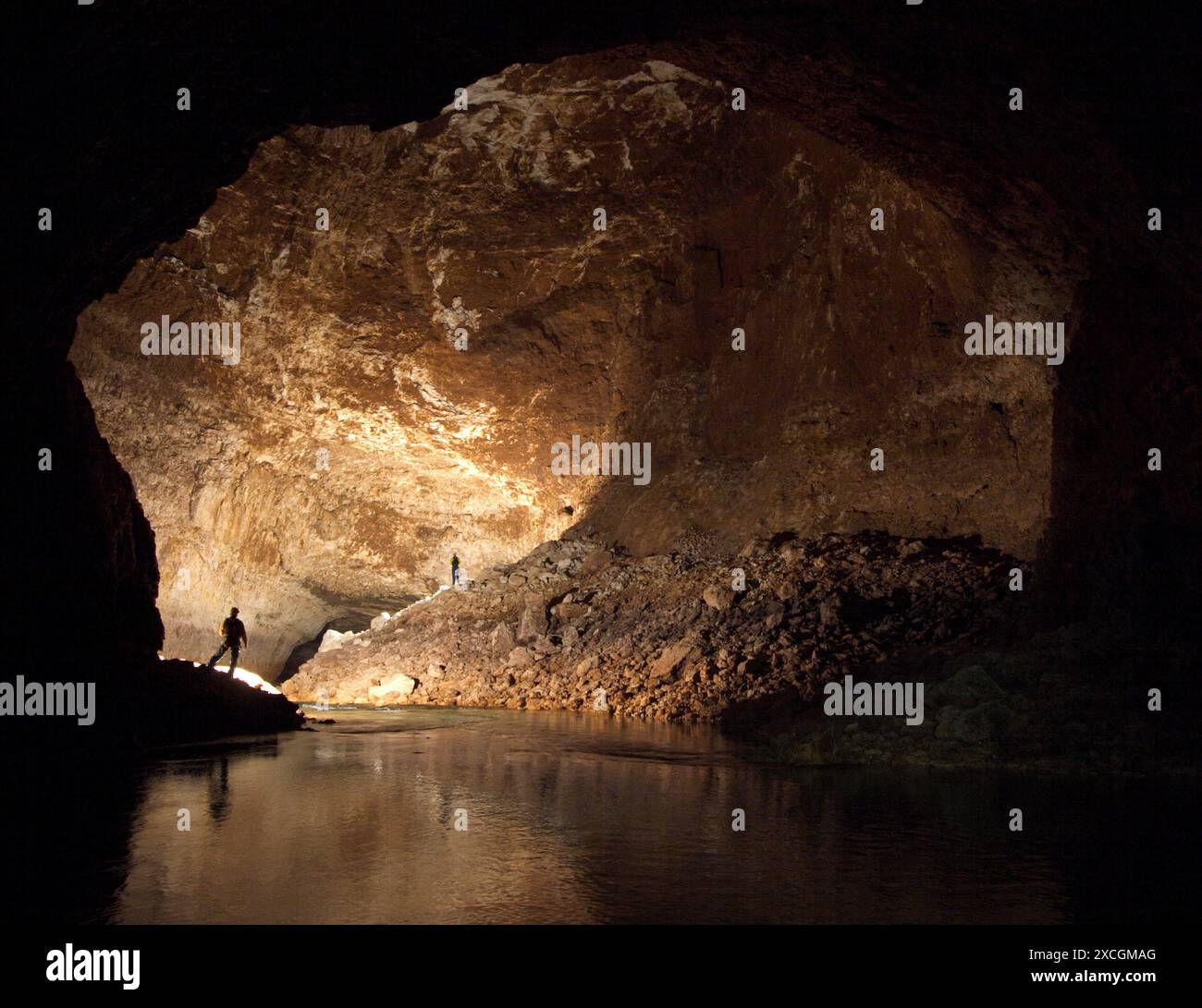 Cave explorers add scale to a giant river passage in a cave in New ...
