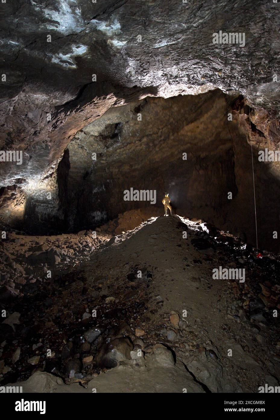 Tiny cave explorer adds scale to a room underground in a cave in the ...