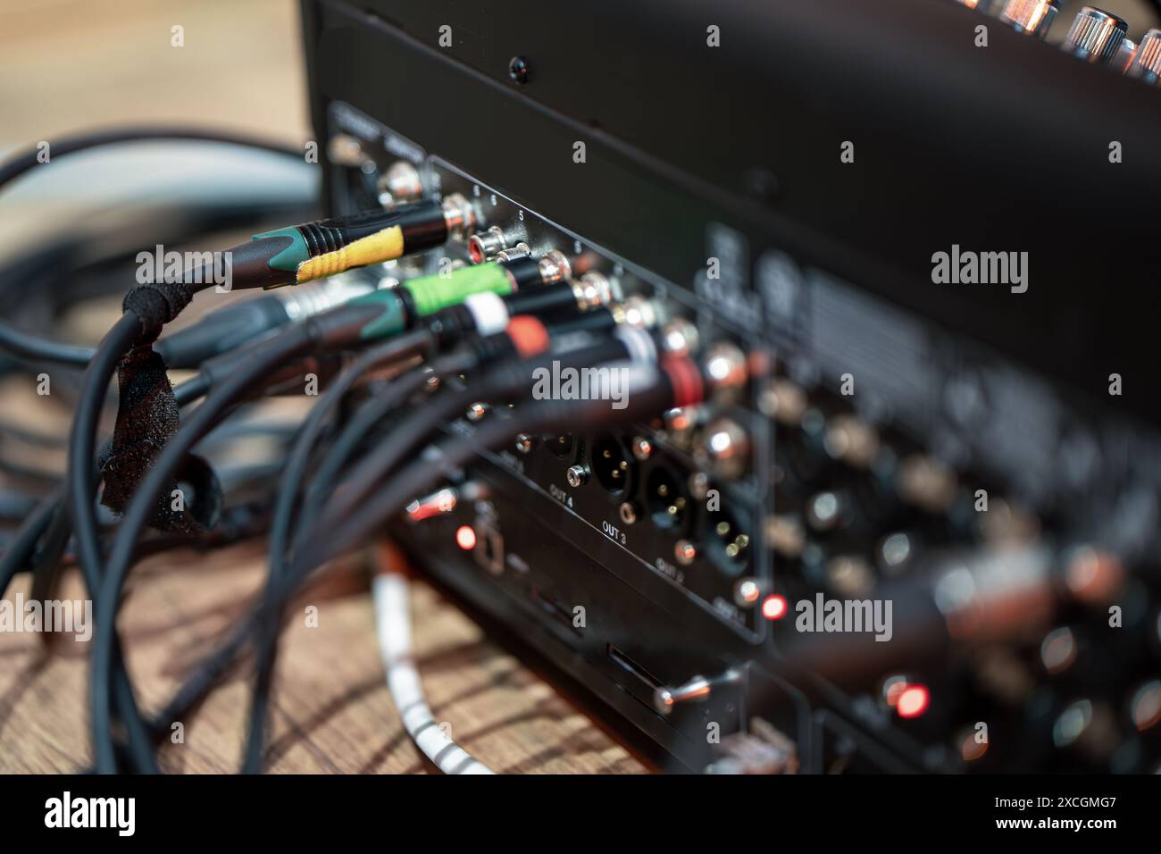 Audio cables connected to professional sound mixer, detailed ...