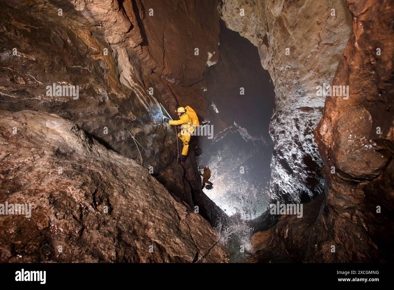 Two male British cave explorers rappel down the Grand Cascade deep ...