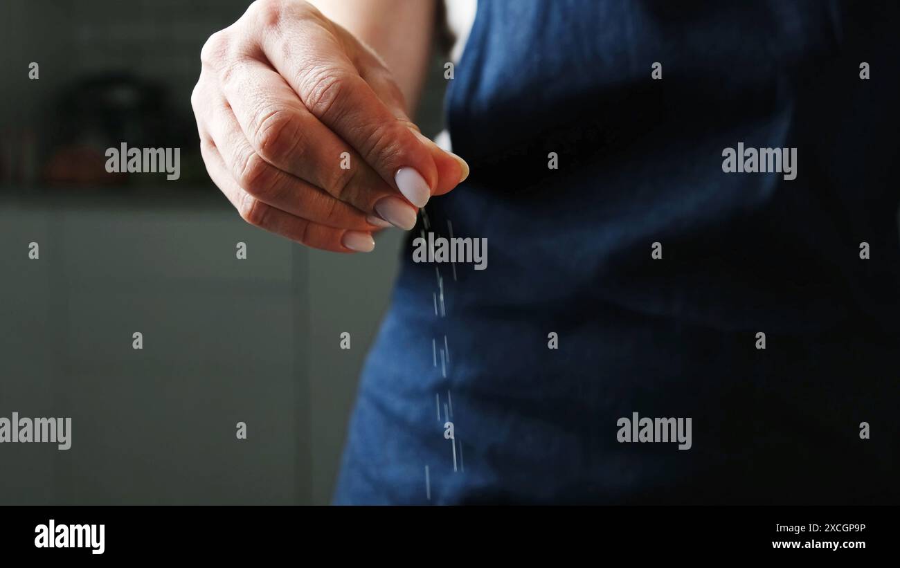 Woman pinch of salt hi-res stock photography and images - Alamy