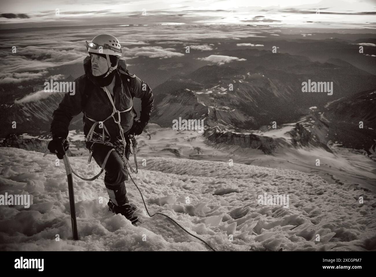 Mountain climber ascending on Emmons-Winthrop climbing route on Mount ...