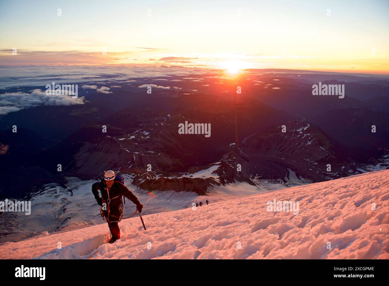 Mountain climber ascending on Emmons-Winthrop climbing route on Mount ...