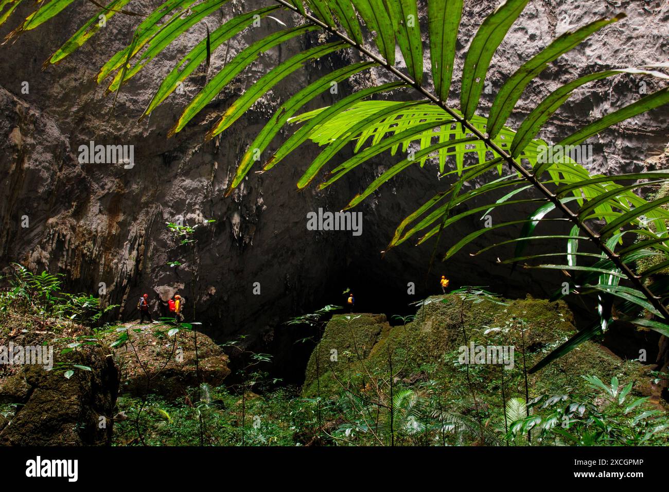 Cave explorers at the first doline, or skylight, in Hang Son Doong ...