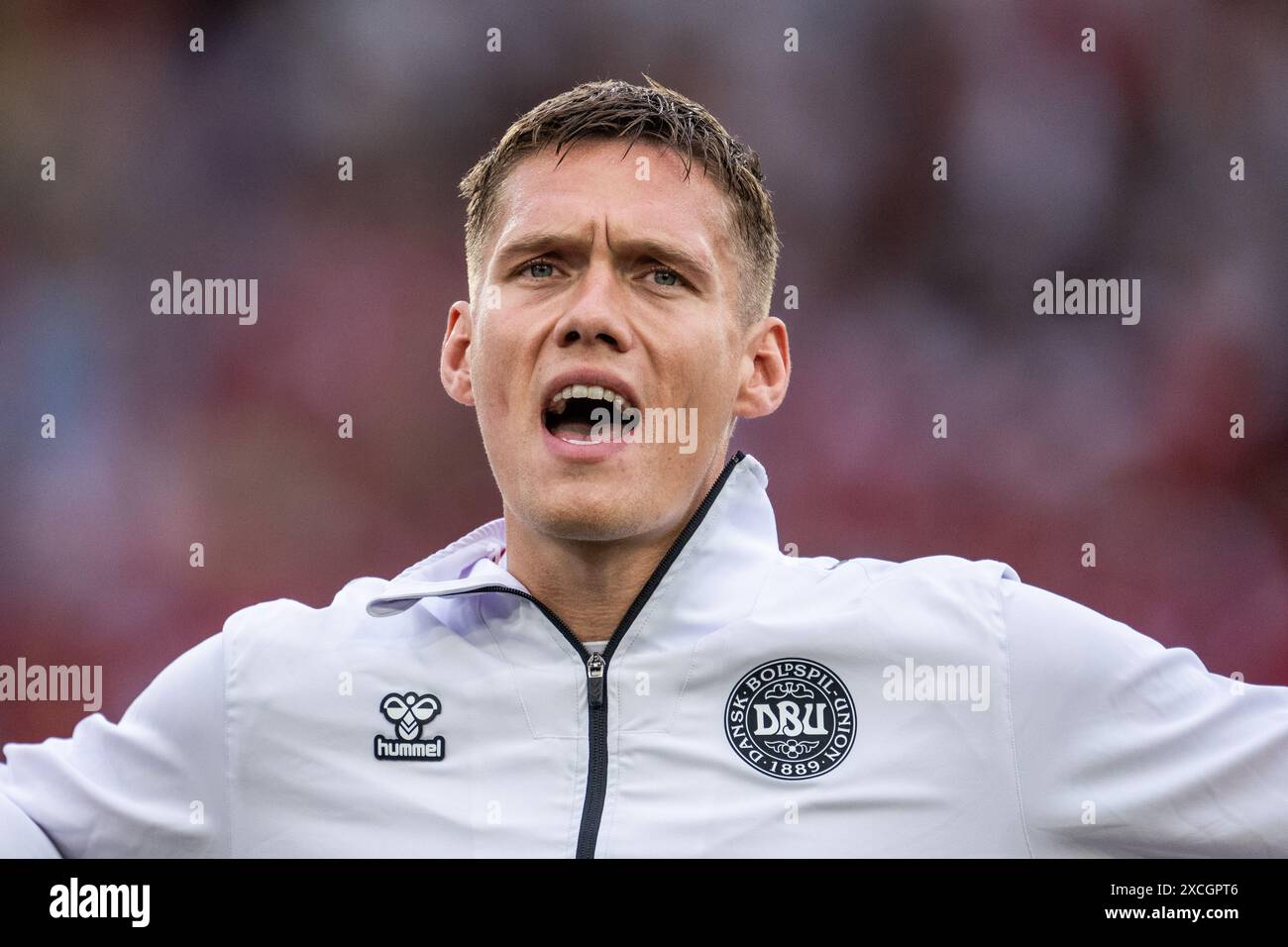 240616 Jannik Vestergaard of Denmark sings the national anthem during ...