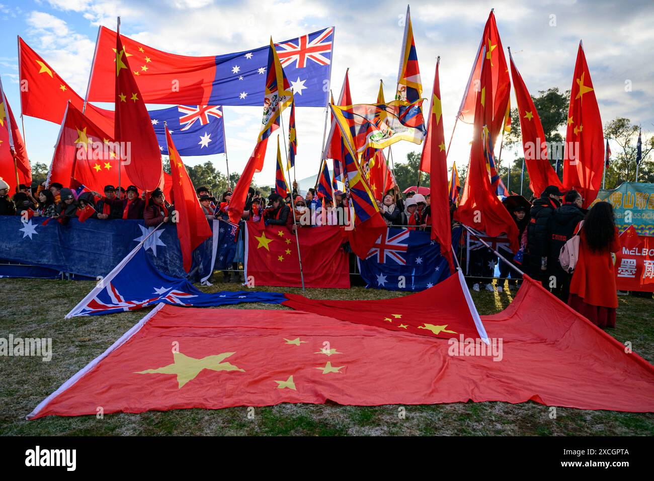 Protesters from the Tibet, Hong Kong, East Turkistan community waving ...