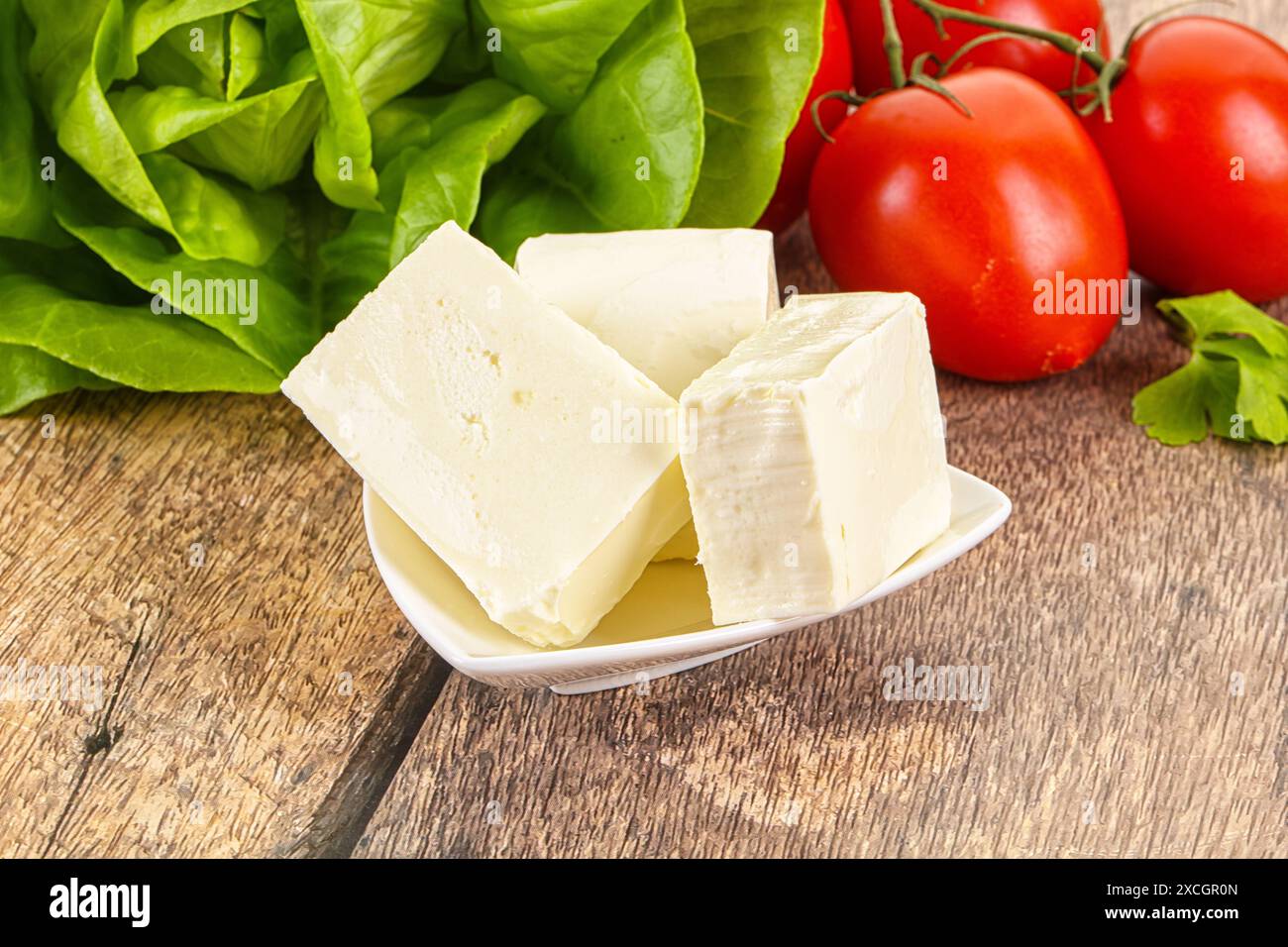 Greek traditional Feta soft cheese in the plate Stock Photo - Alamy