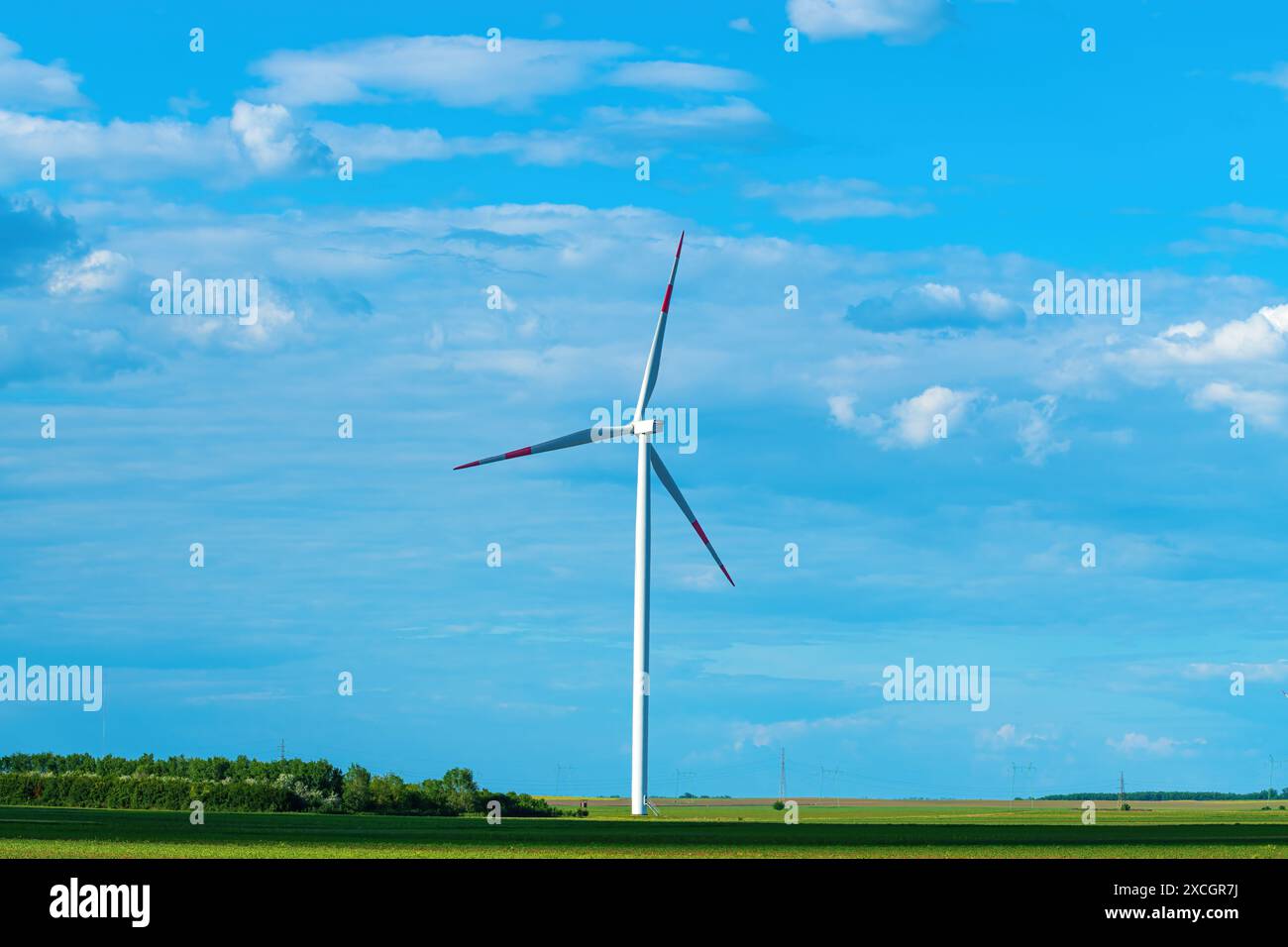 Single wind turbine in beautiful countryside landscape, selective focus ...