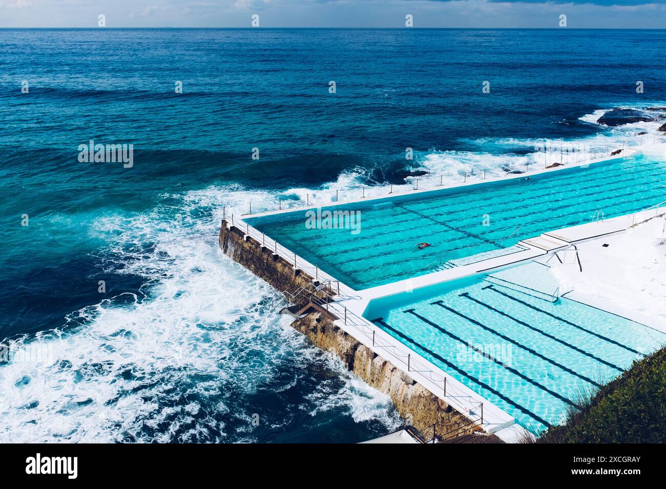 Man swimming alone at Iceberg pools Stock Photo - Alamy