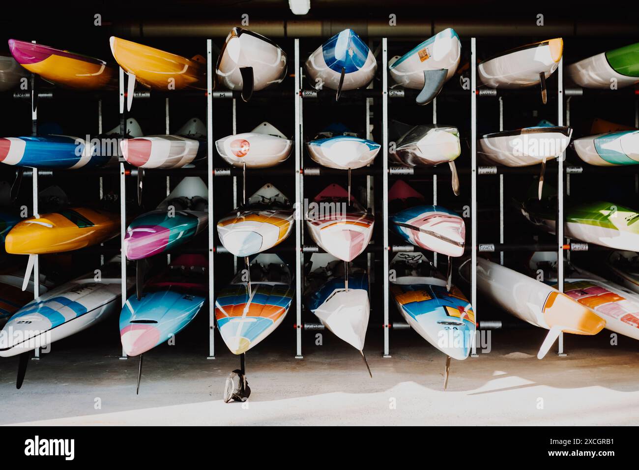 Kayaks tidied up on Noosa Beach Stock Photo - Alamy
