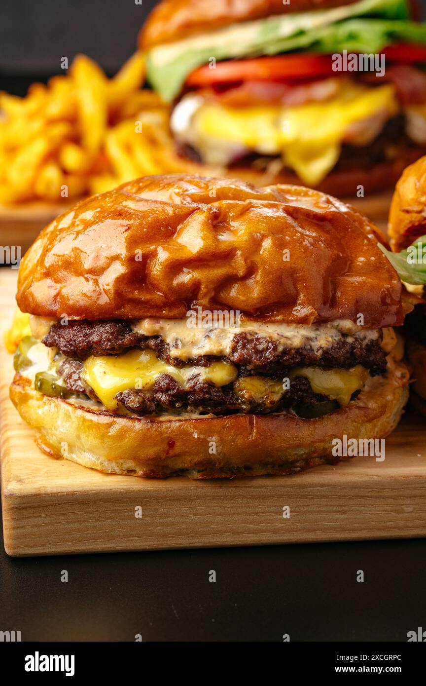 Fat eating burgers hi-res stock photography and images - Alamy